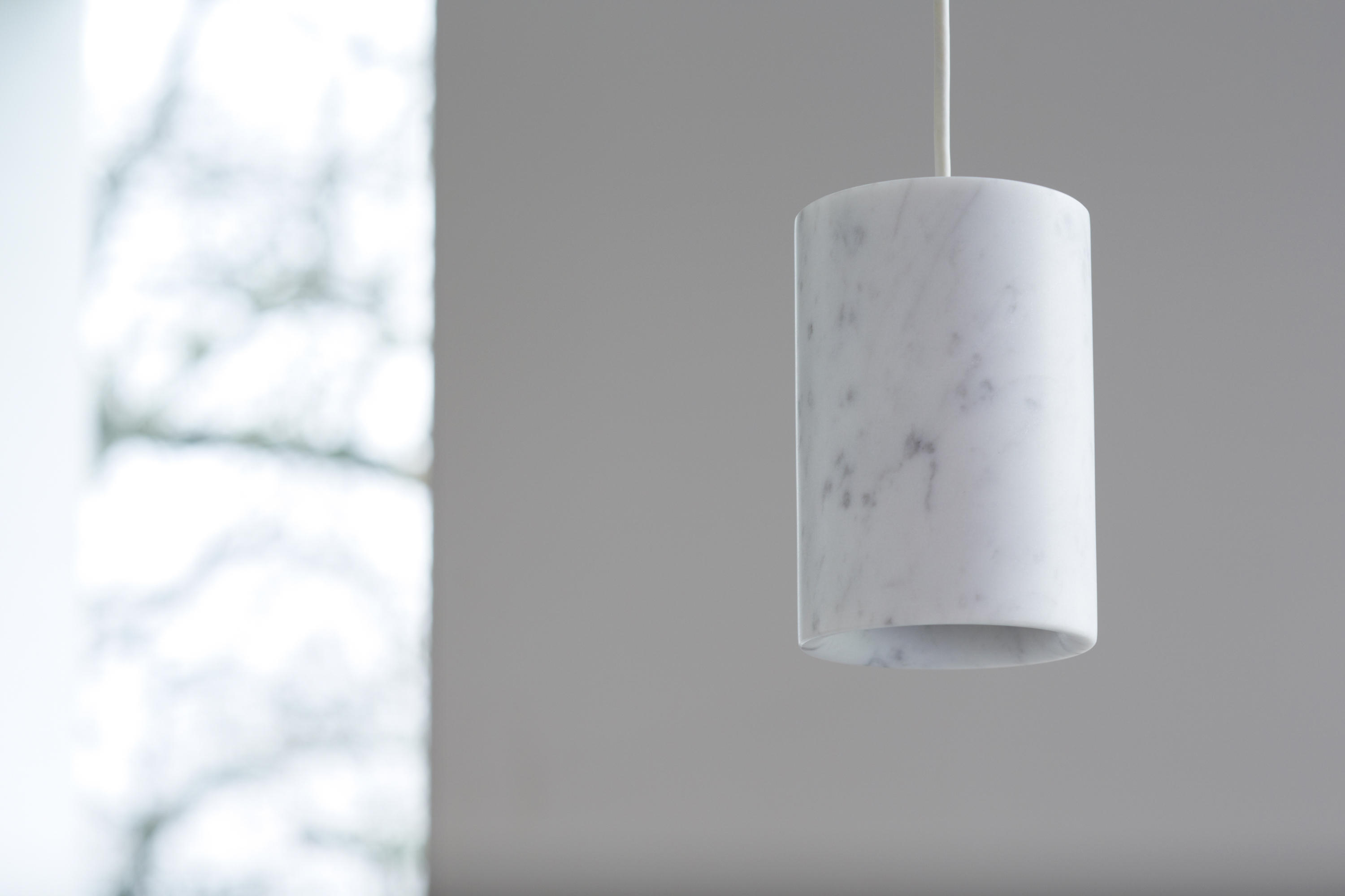 Solid | Pendant Cylinder in Carrara Marble | Architonic