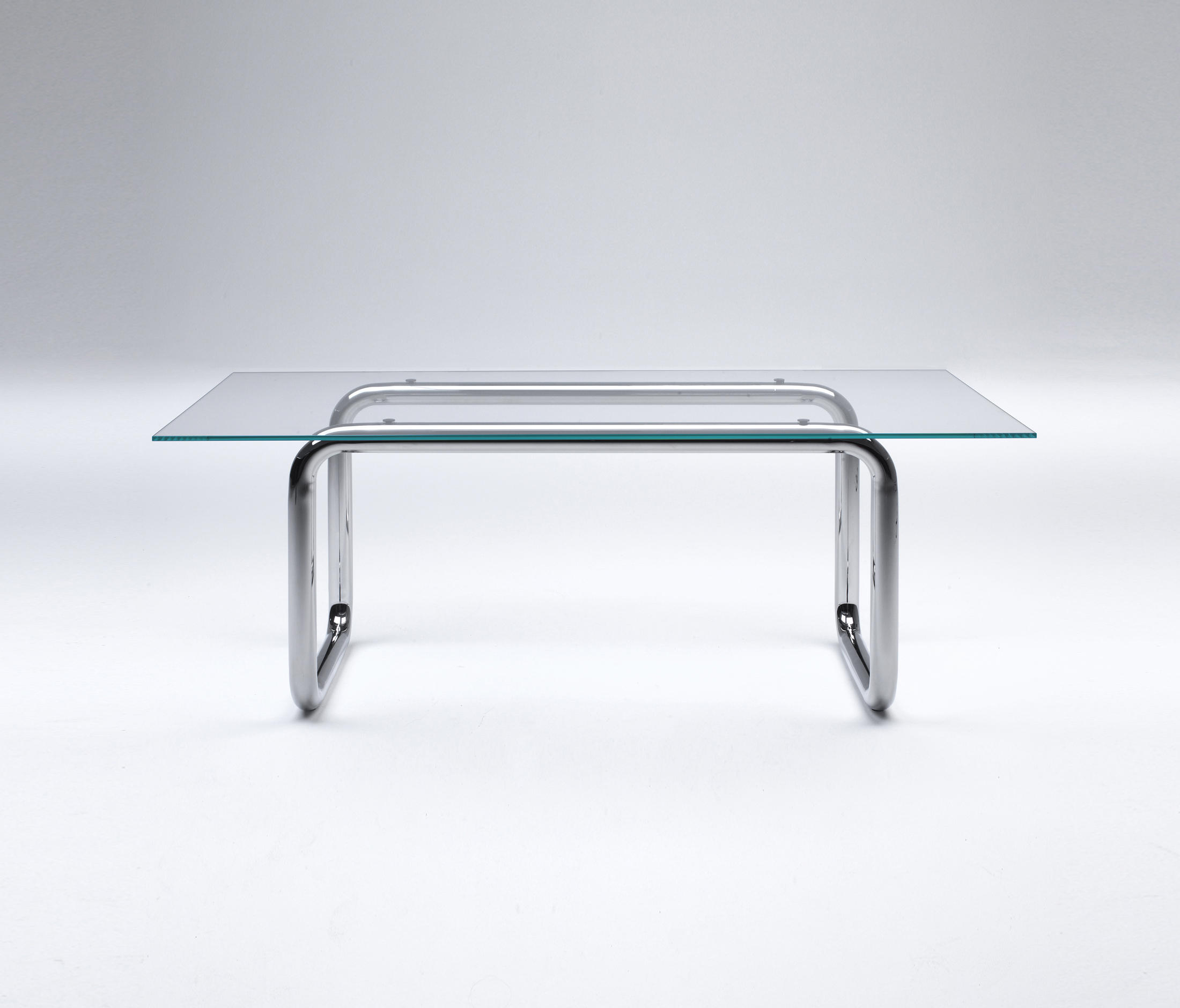 Glas table with pipe legs | Architonic
